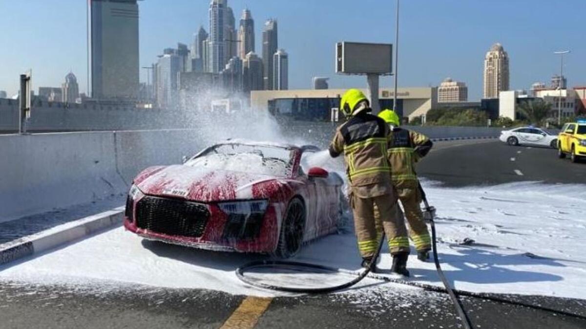 Dubai: Supercar catches fire on Sheikh Zayed Road, put out within ...